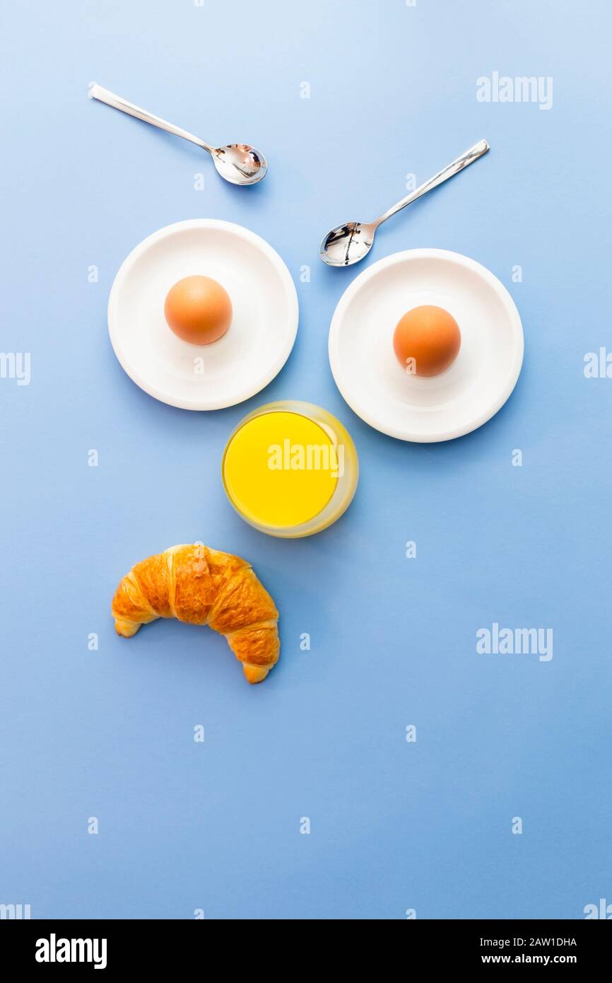 Fun breakfast concept with abstract angry grumpy human face made of ...