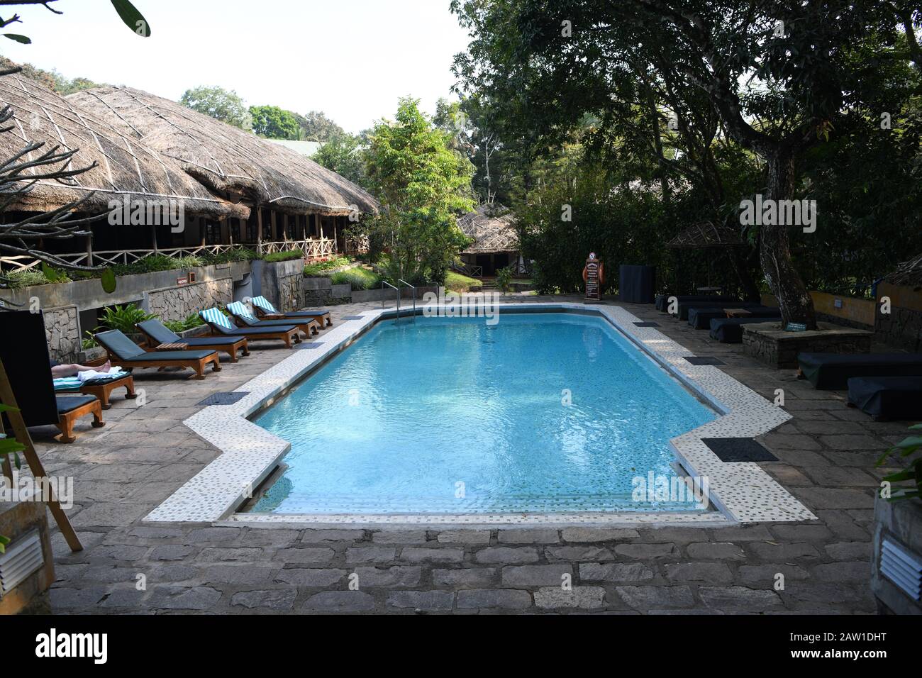 The swimming pool, Spice Village (CGH earth hotel), a tribal village ...
