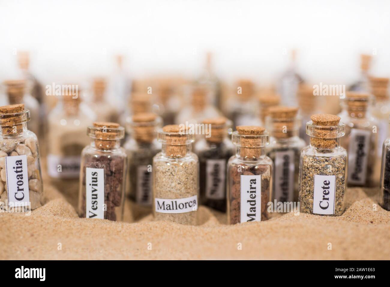 Glass test-tube with sand of different summer vacation countries Stock ...