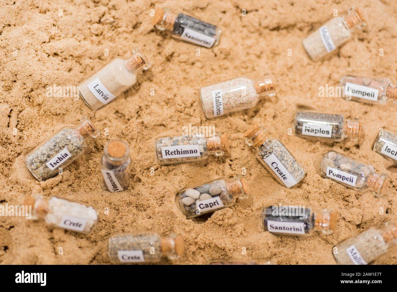 Glass test-tube with sand of different summer vacation countries Stock ...
