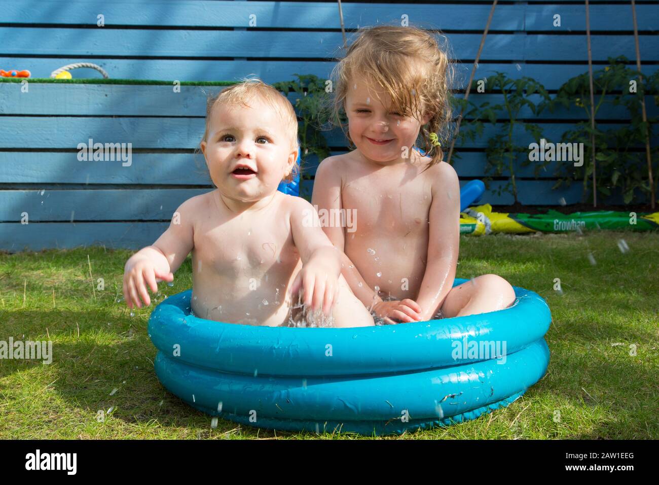 Kids Splashing In Paddling Pool High Resolution Stock Photography and ...