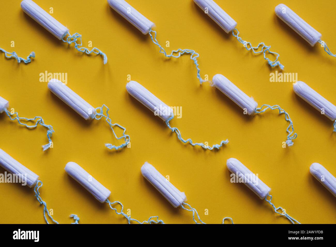 tampon flat lay - many tampons arrangement in rows - period or ...