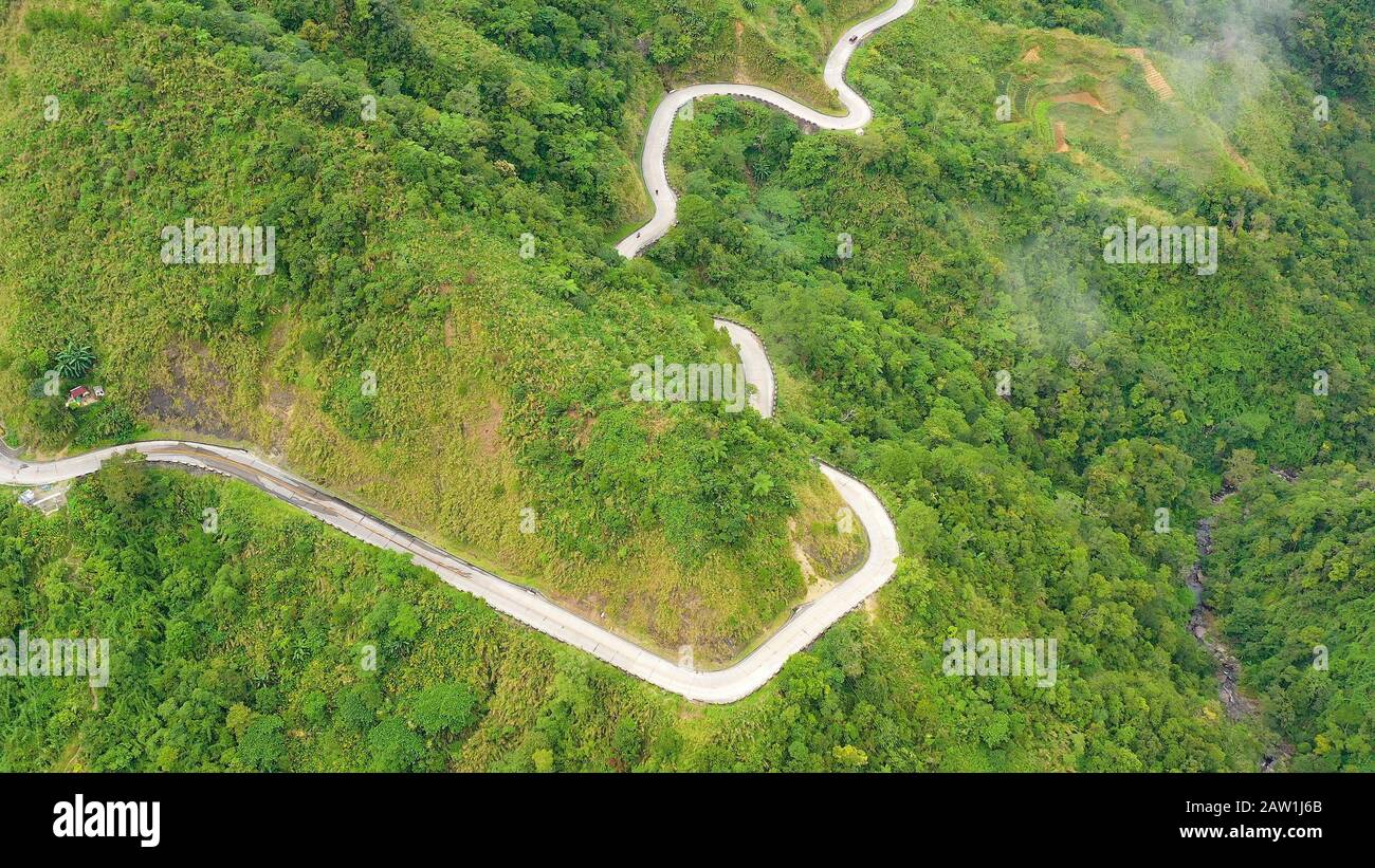Mountain curve road passing along the slopes of mountains and hills ...