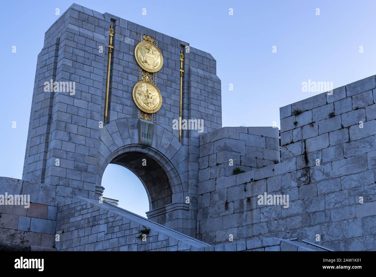 City walls and entrance in Gibraltar old town seen from outside the ...