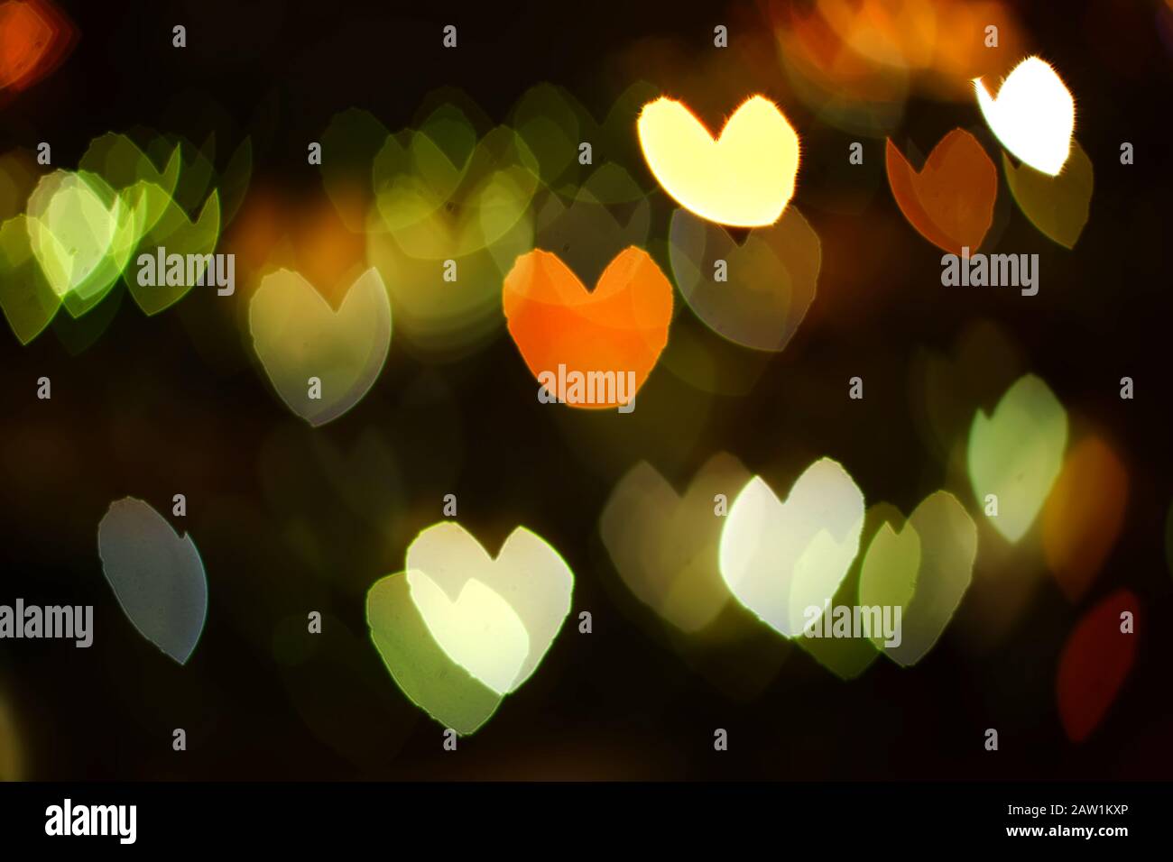 Abstract blurred heart bokeh lights backgrounds, Colorful blurred bokeh of city night light ...