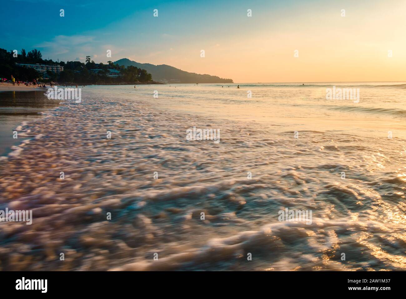 Phuket Kamala beach, Thailand, with a stunning golden sunset view on ...