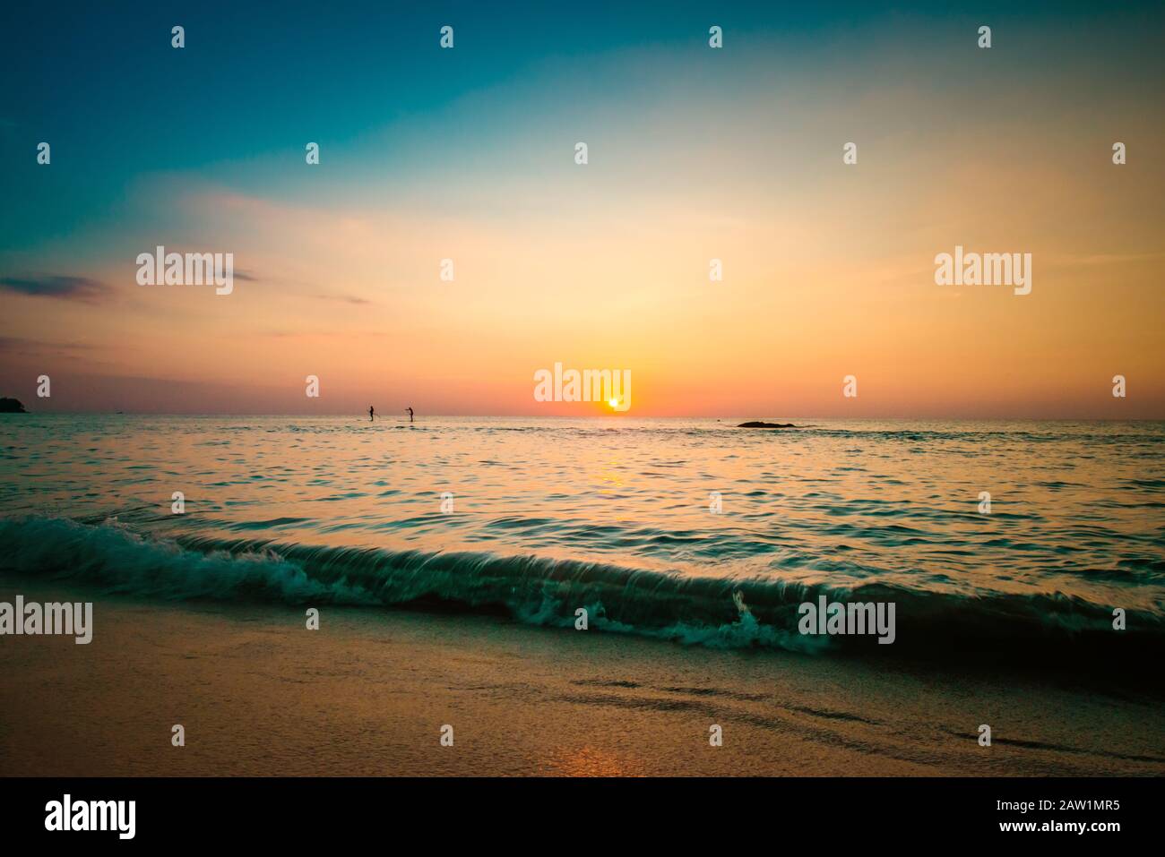 Phuket Kamala beach, Thailand, with a stunning golden sunset view on ...