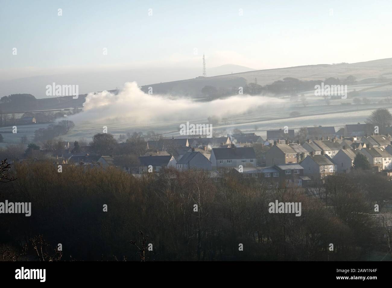 Smoke rises in New Mills, Derbyshire Stock Photo - Alamy