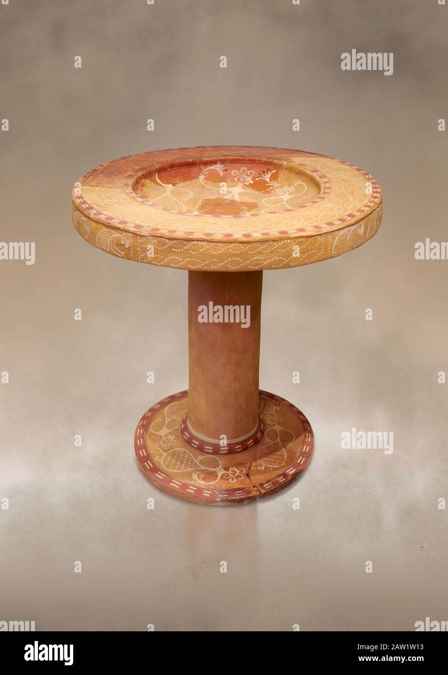 Minoan clay round offering table with a high base and large cup with a ...