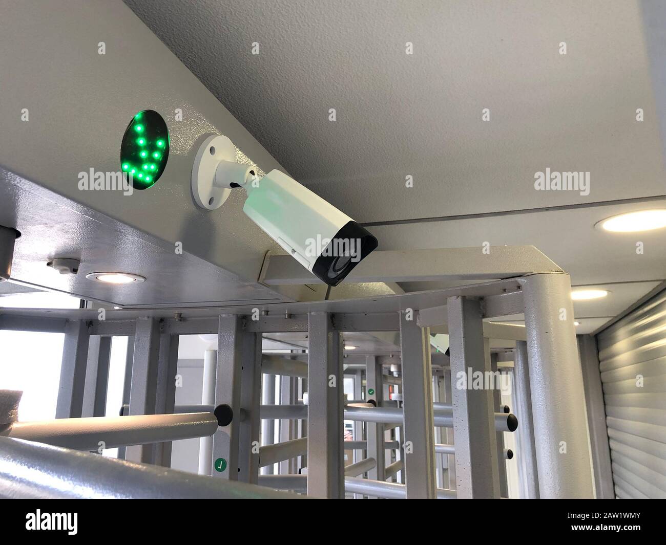 IP camera and green arrow indicator on turnstile Stock Photo - Alamy