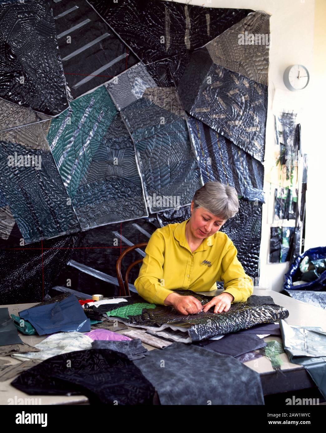 Fabric artist working in studio Stock Photo - Alamy