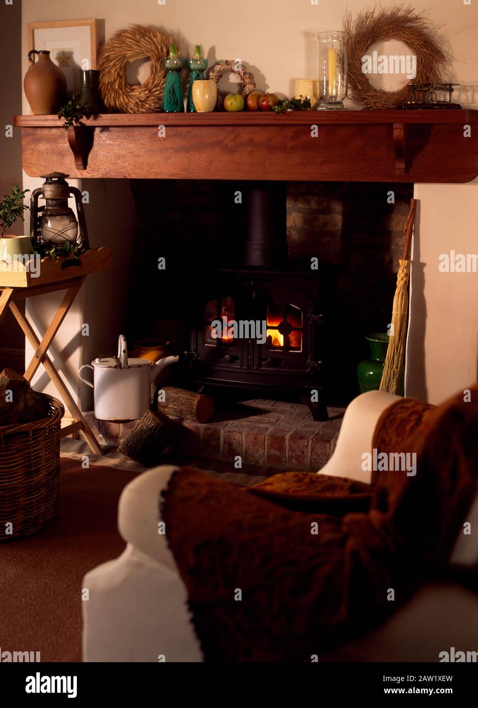 Open fire in cottage hearth Stock Photo - Alamy