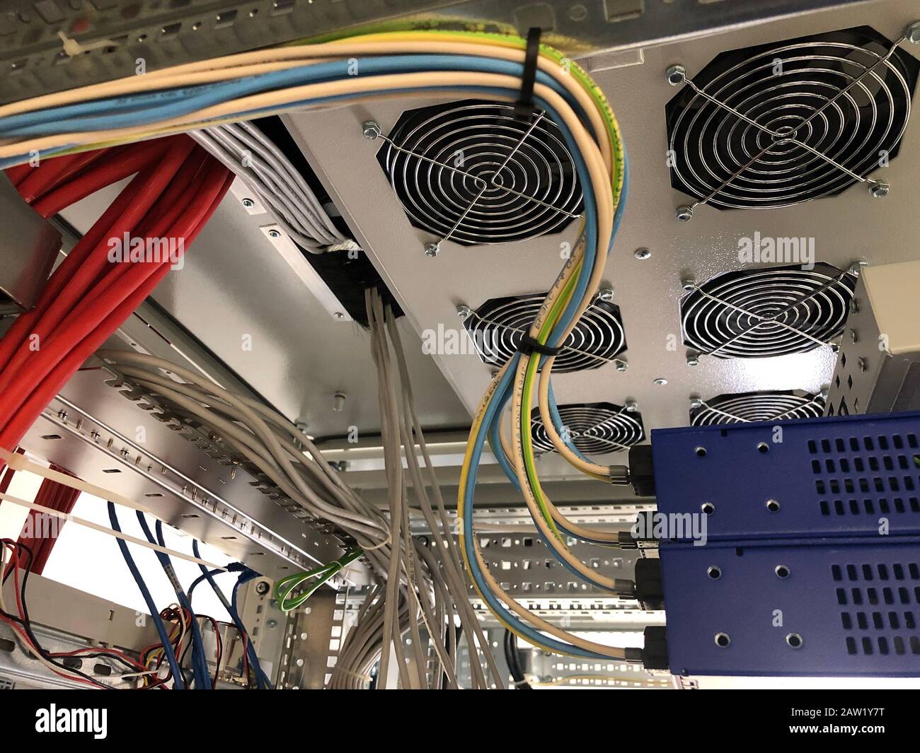 Multi colored network cables connected to data center server Stock ...