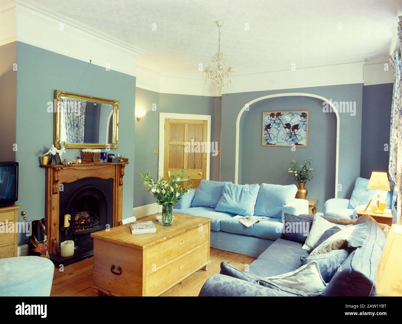 Traditional livingroom with open fire Stock Photo - Alamy