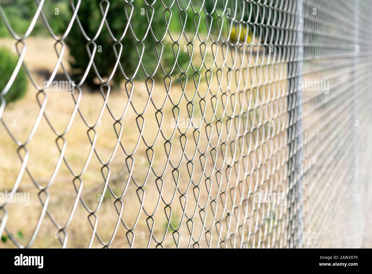Wire fence. Perspective. Close up Stock Photo - Alamy