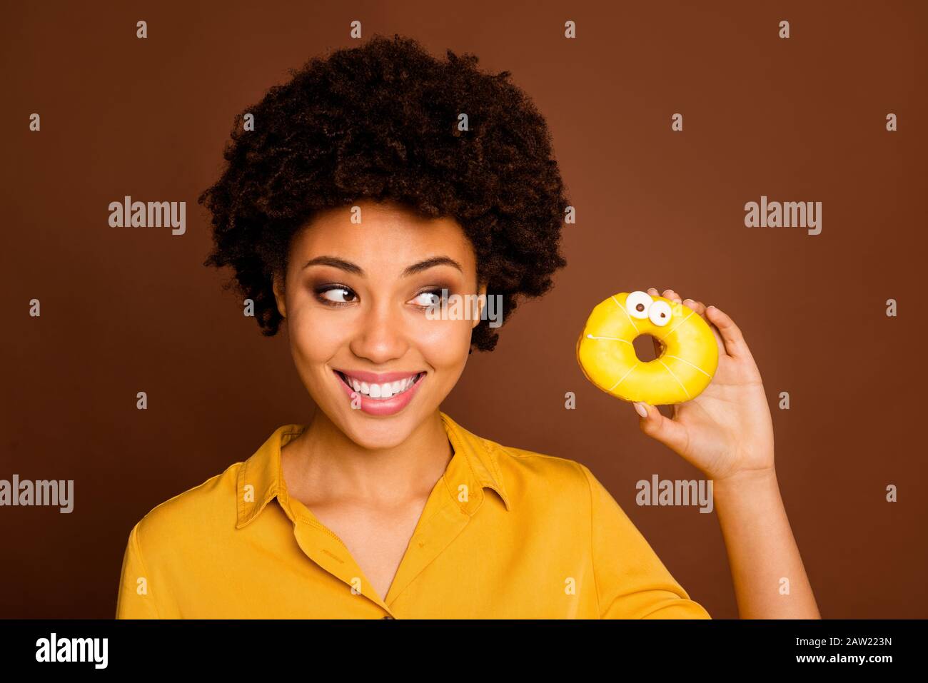 You look so tasty cookie. Closeup photo of funky dark skin lady hold ...