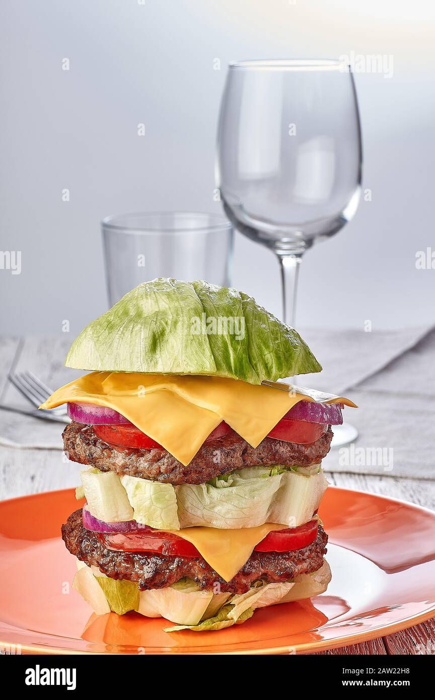 burger without bun on lettuce, gluten free, with vegetables, beef ...