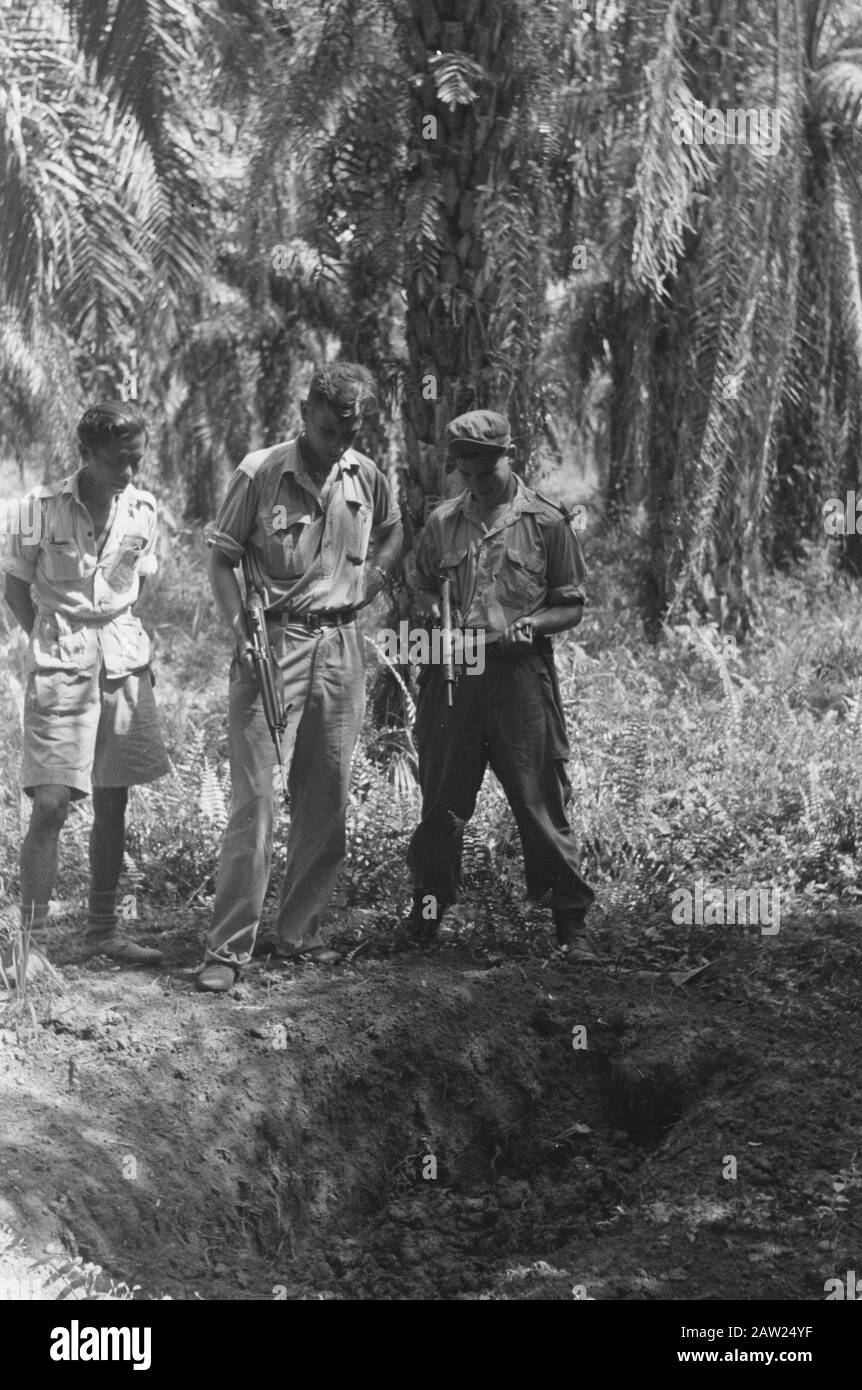 Palembang Palembang. Rubber Company Tebenan. Armed Dutchman with two ...
