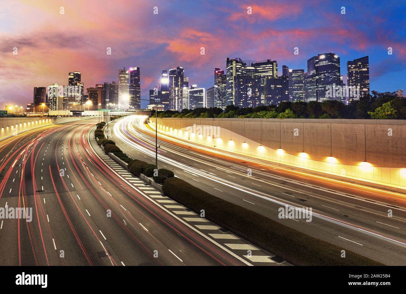 Singapore traffic at twilight - financial downtown Stock Photo - Alamy