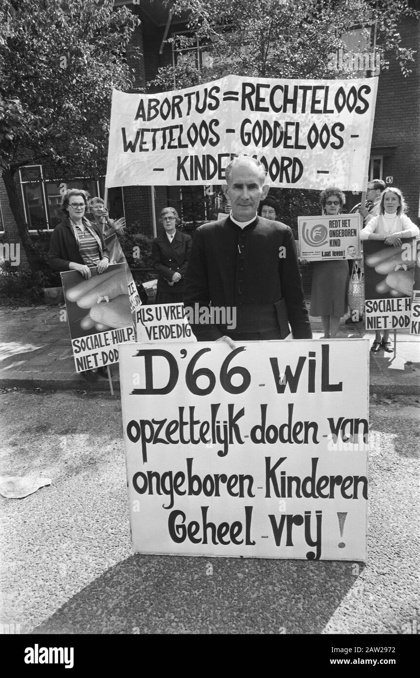 Father Koopmans demonstrates porch D66 parliament member Mrs. Wessel ...