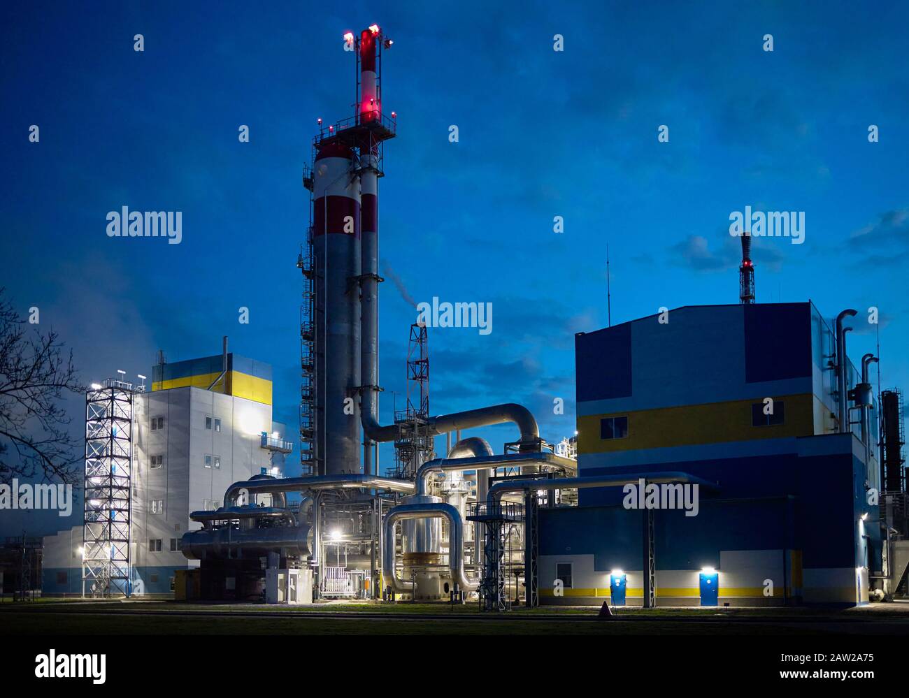 Beautiful scenic of petrochemical oil refinery plant shines with red ...