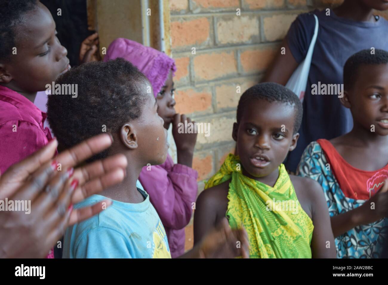 A group of happy school children playing at Kande Beach, Malawi Stock ...