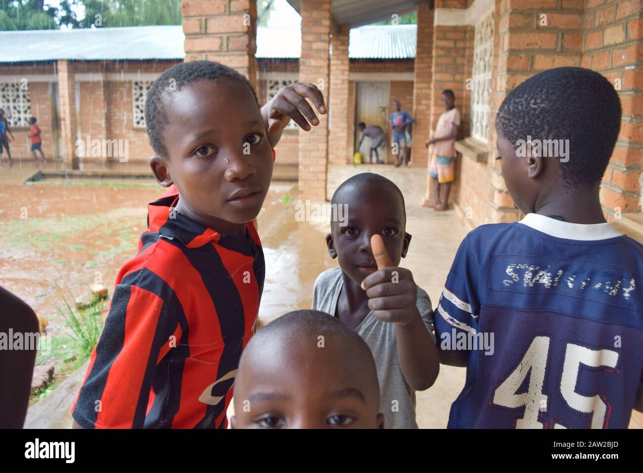 A group of happy school children playing at Kande Beach, Malawi Stock ...