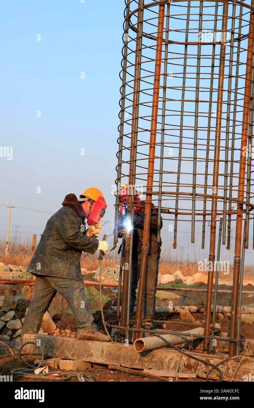 Bridge construction under performing the steel reinforcement of piling ...