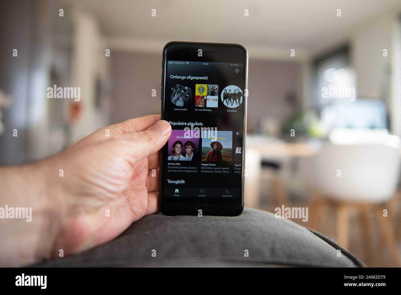 Amsterdam, The Netherlands, 02/06/2020, Man holding his phone, Spotify ...