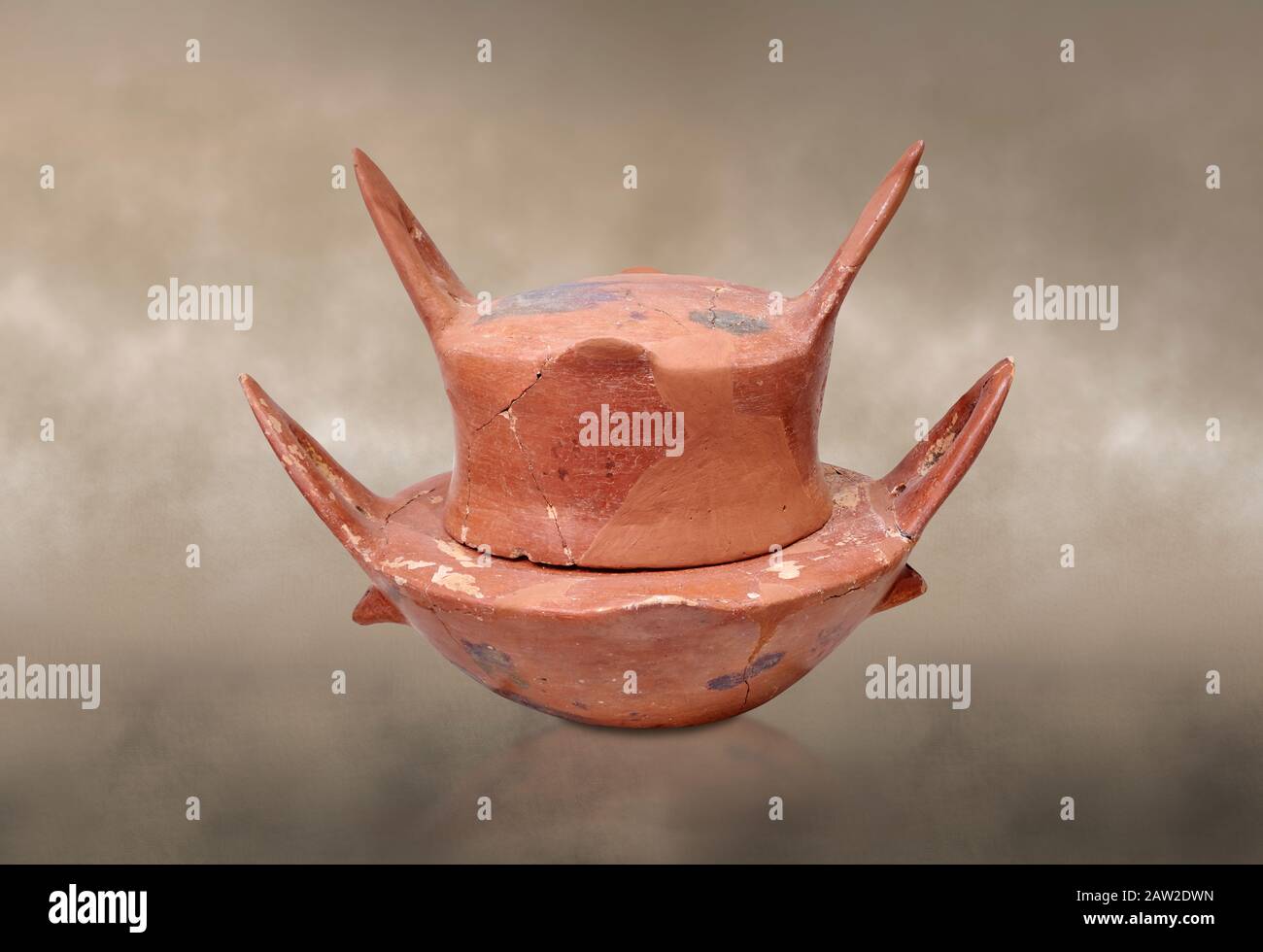 Very early unusual Minoan horned pot with white and red linear motifs ...