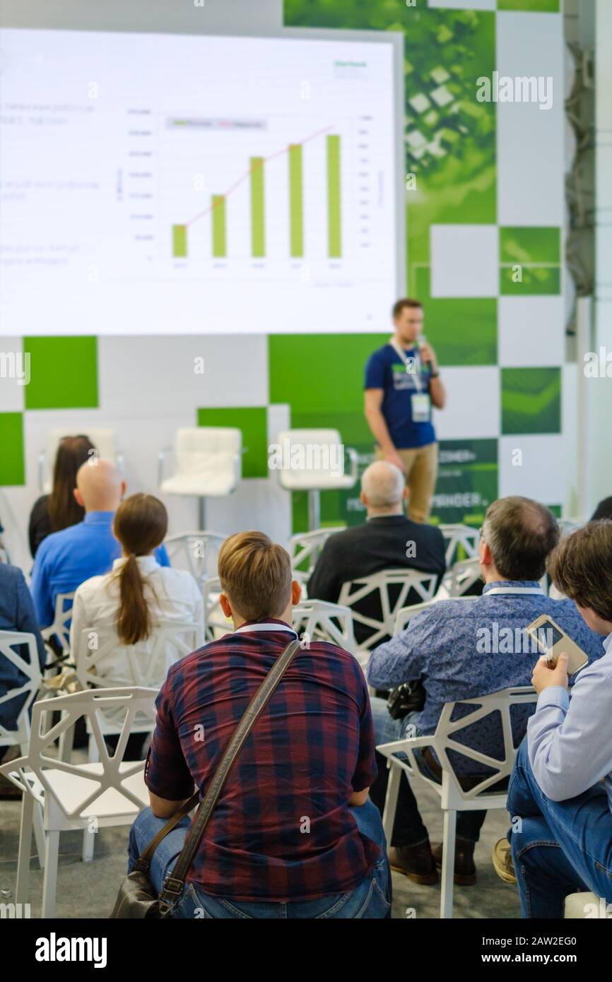 Business conference attendees sit and listen Stock Photo - Alamy