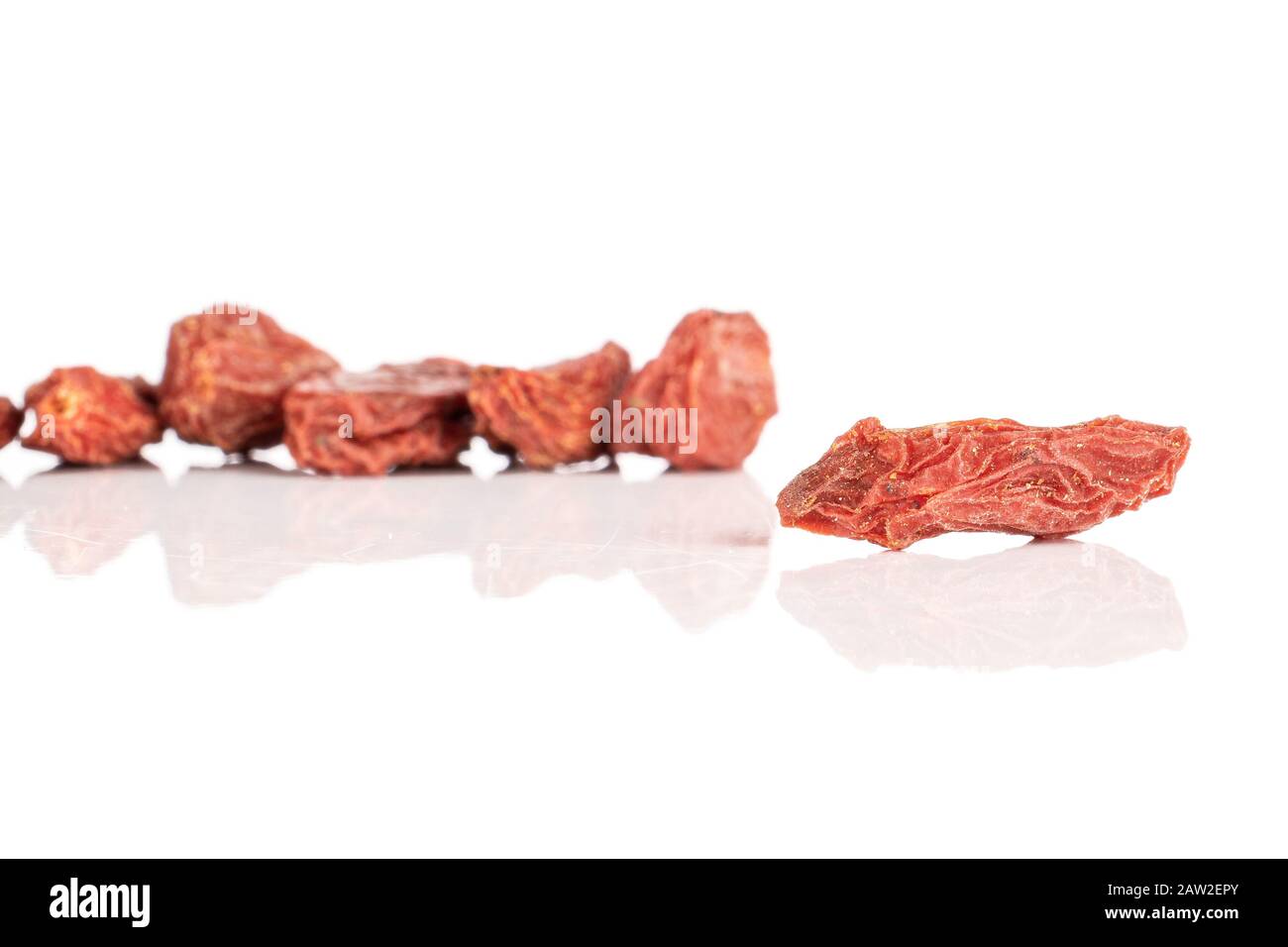 Group of six whole dried red goji isolated on white background Stock ...