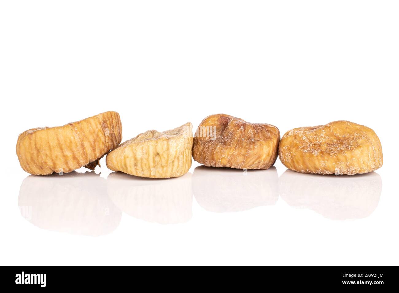 Group of four whole dried fig isolated on white background Stock Photo ...