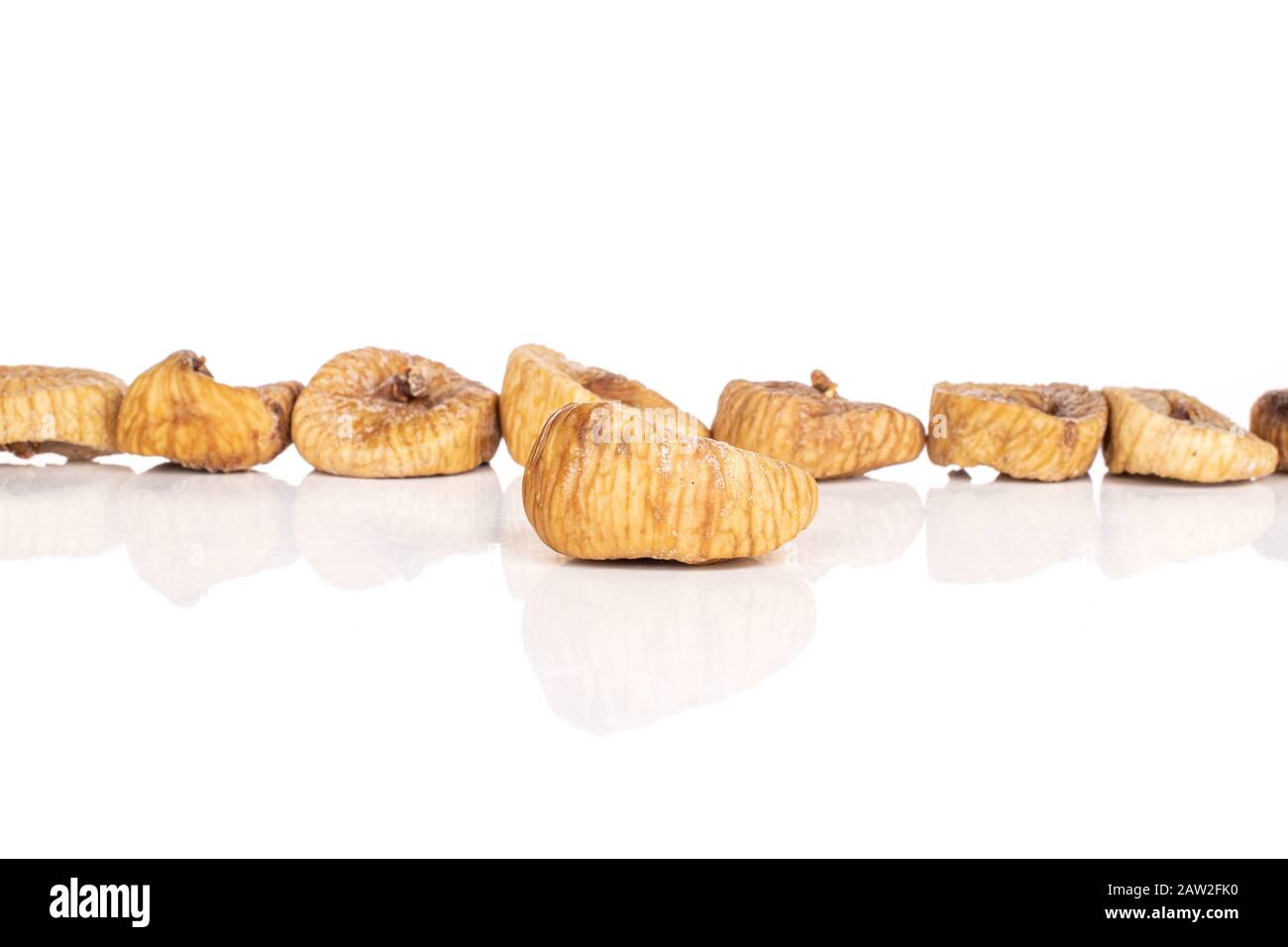 Lot of whole dried fig front focus isolated on white background Stock ...