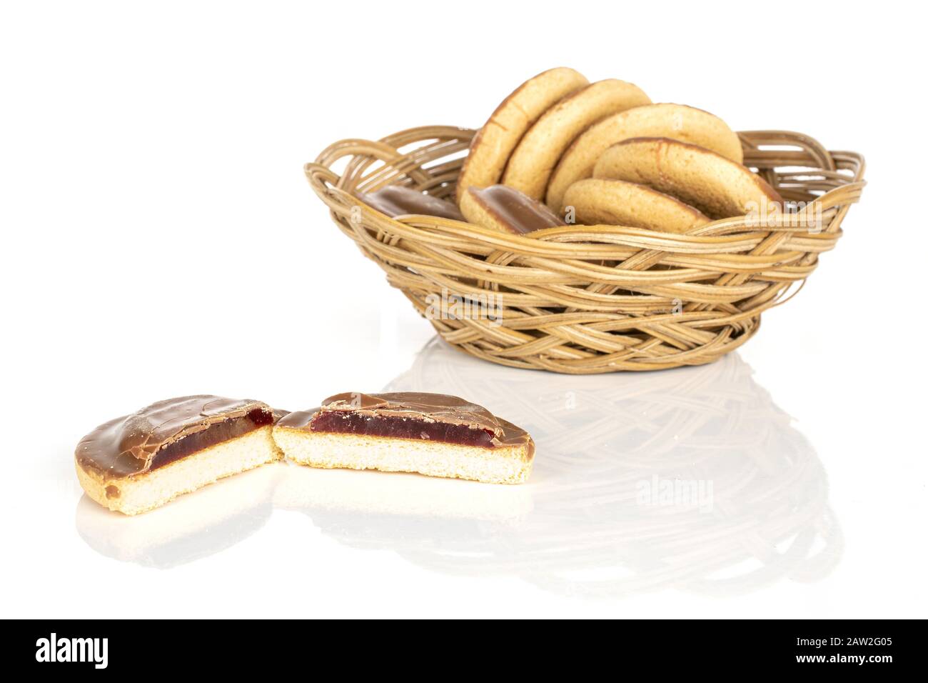 Group of lot of whole two halves of chocolate biscuit in round rattan ...