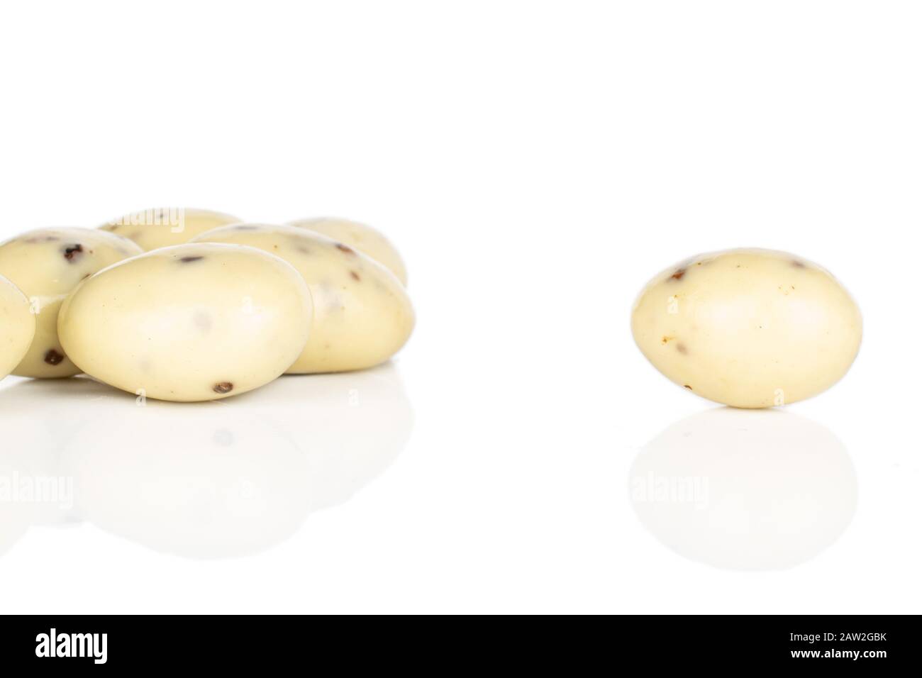 Lot of whole coated white almond nut stracciatella isolated on white ...