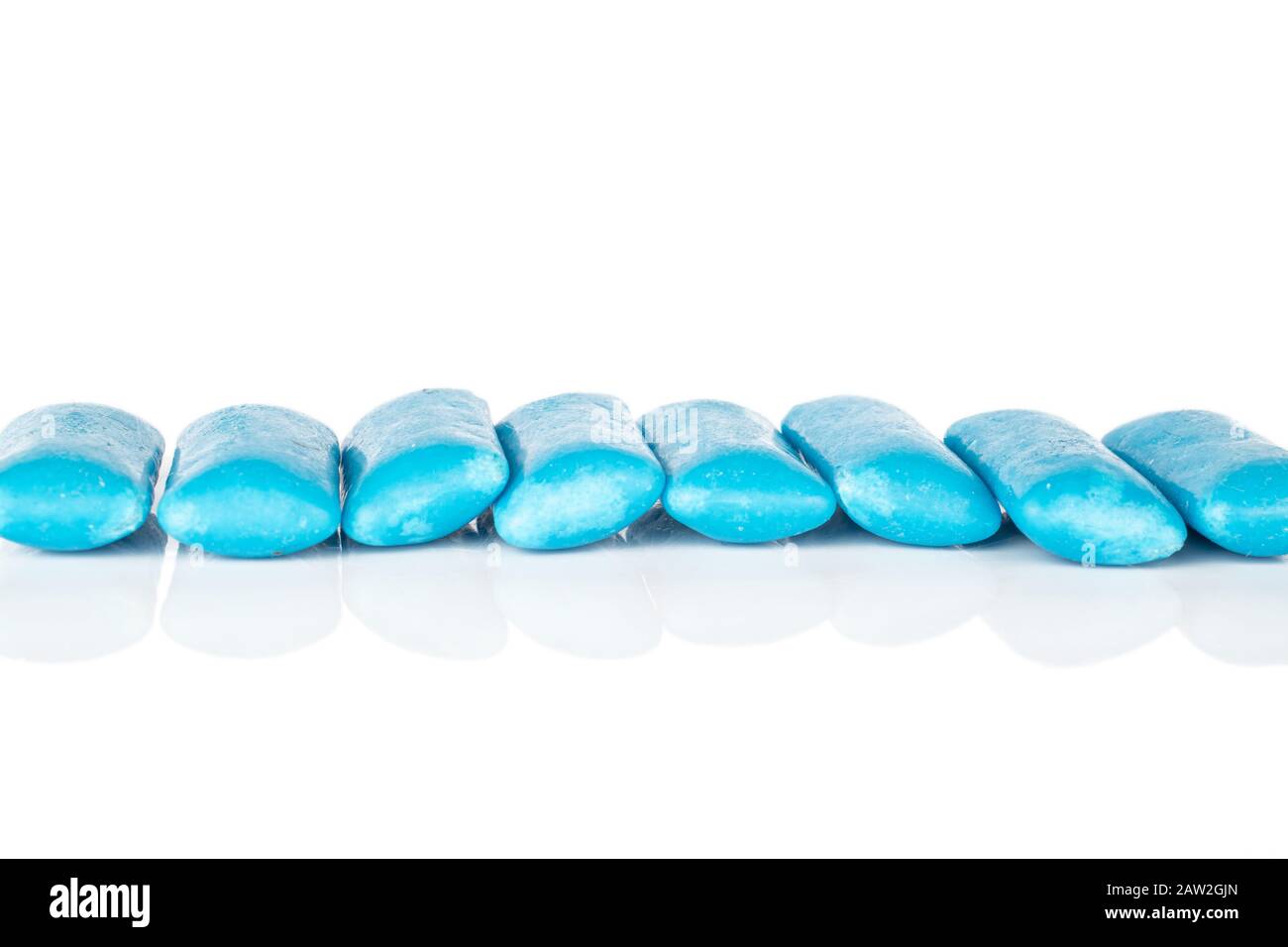 Group of eight whole blue chewing gum line isolated on white background ...