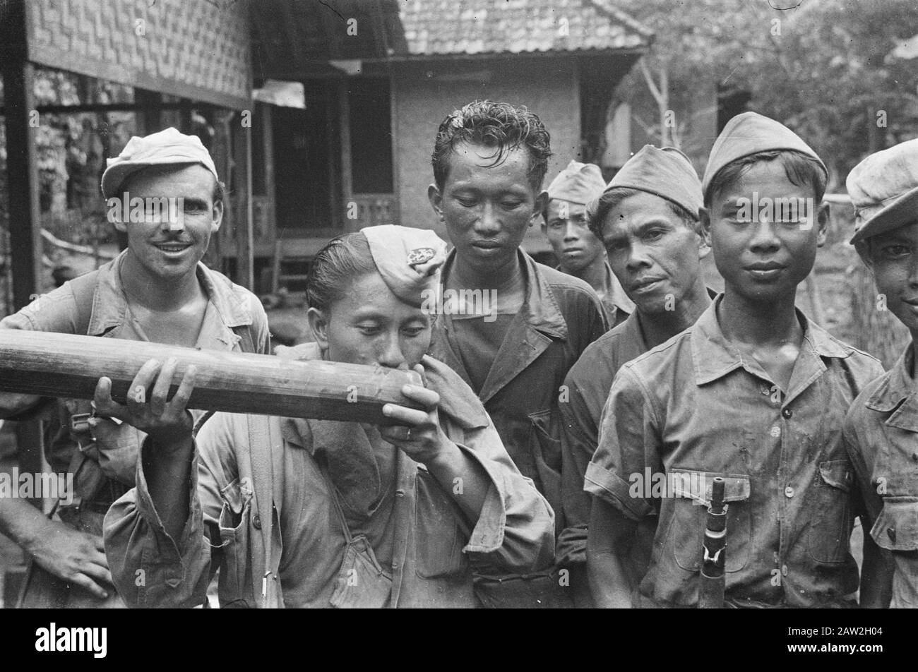 Soebang and environment KNIL soldiers (during a purge). The man left to ...