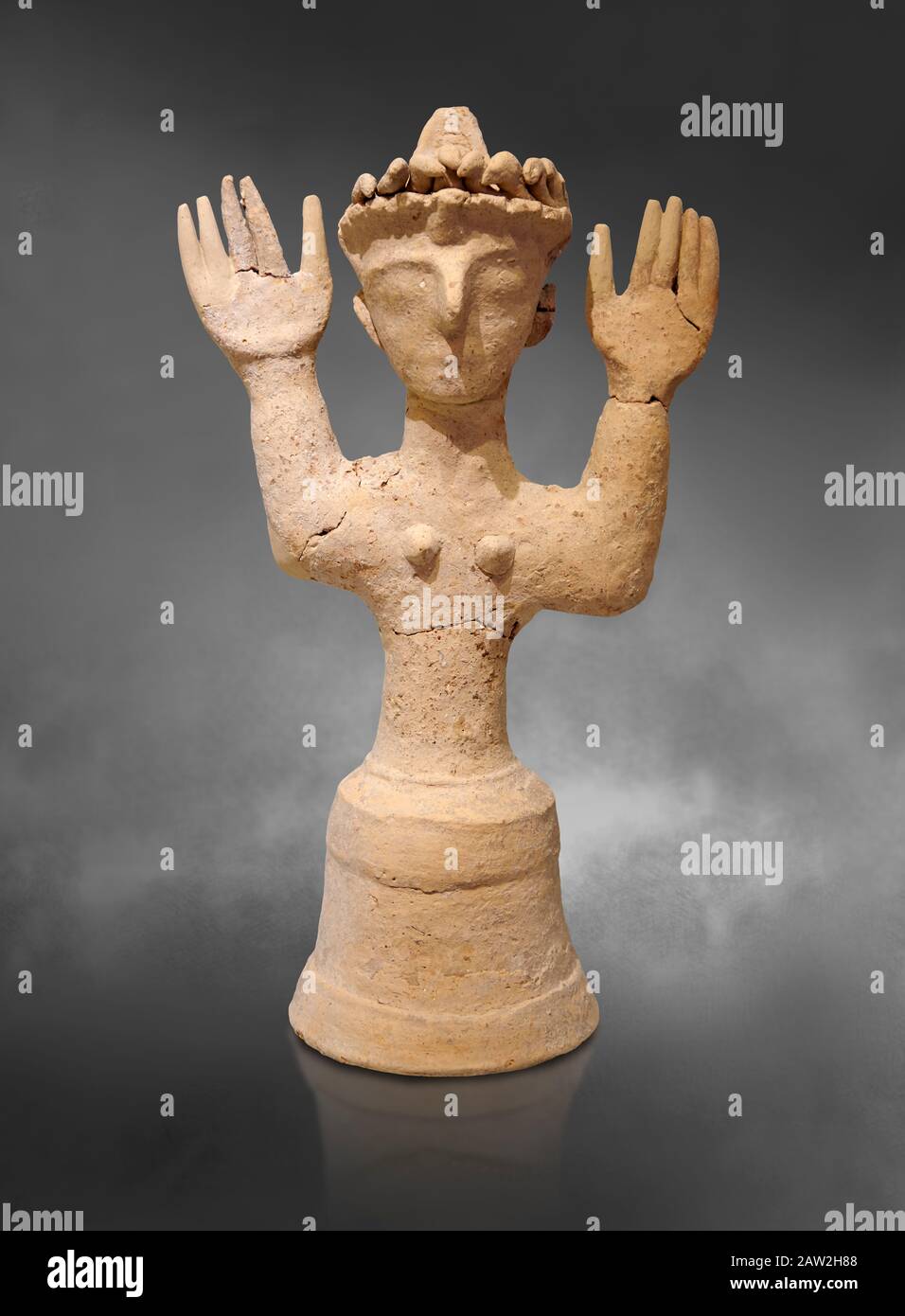 Minoan Postpalatial terracotta goddess statue with raised arms and a ...
