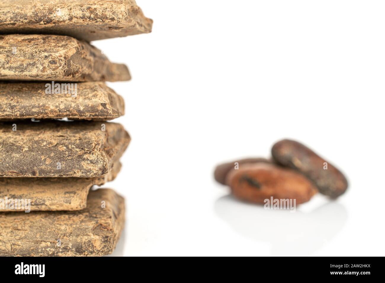 Group of three whole fresh brown cocoa bean front focus with cocoa ...