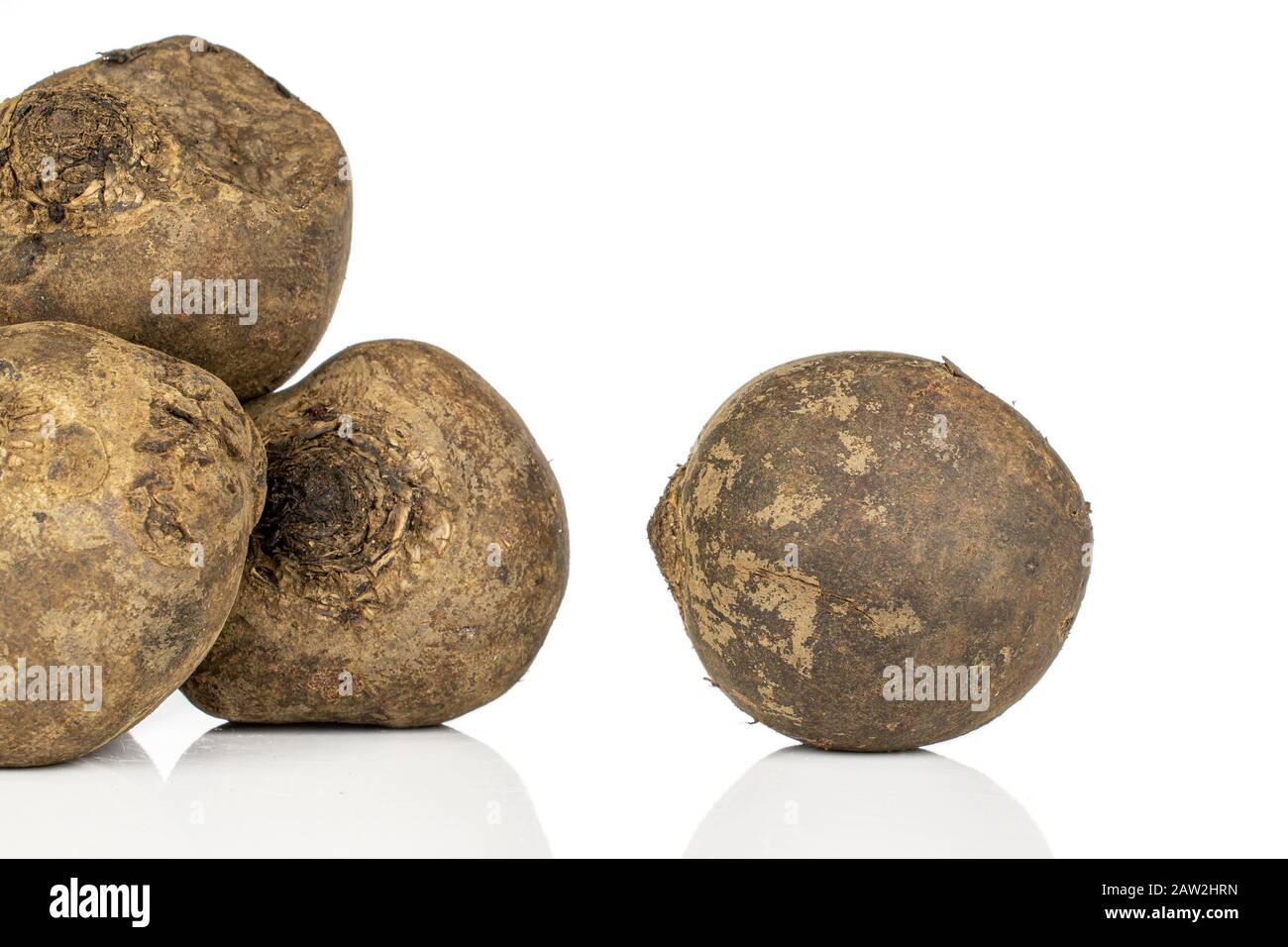 Group of four whole fresh raw sweet beetroot isolated on white ...