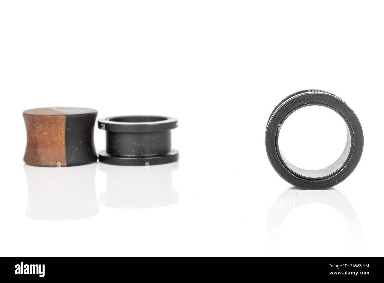 Group of three whole plug isolated on white background Stock Photo - Alamy