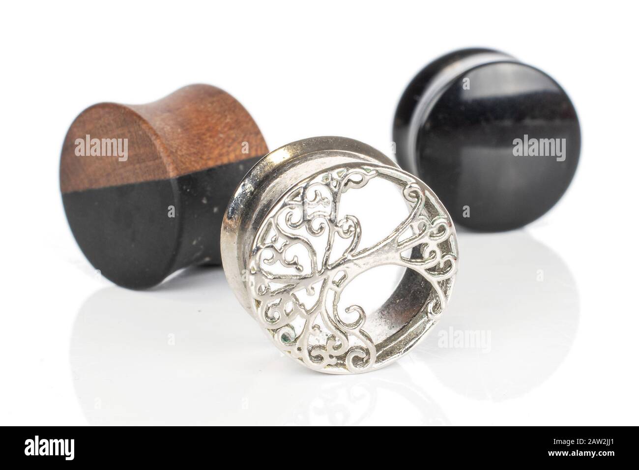 Group of three whole plug isolated on white background Stock Photo - Alamy