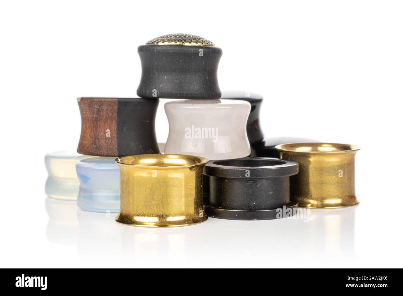 Lot of whole plug stack isolated on white background Stock Photo - Alamy