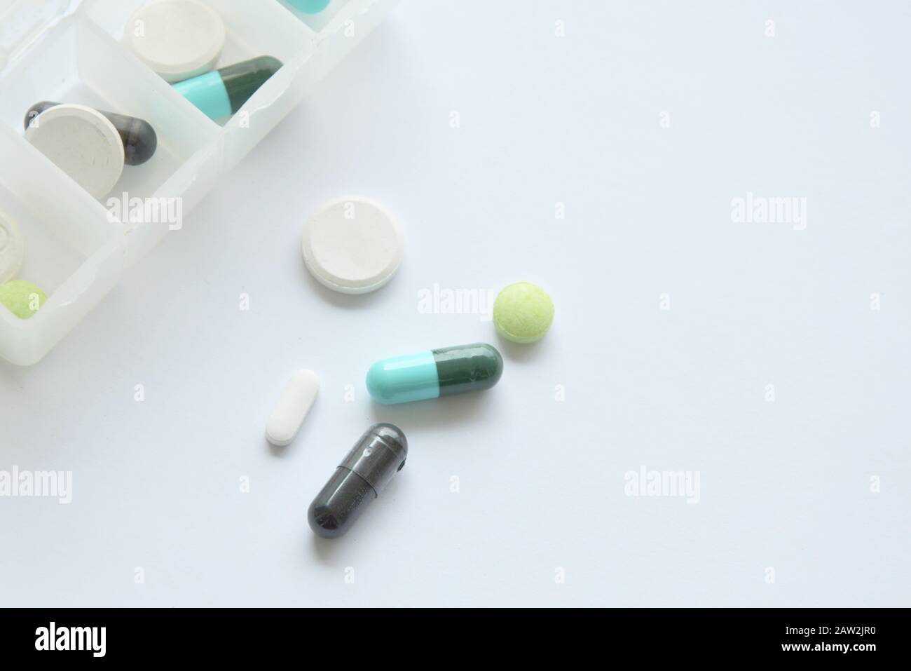 medical and drugs in plastic box background Stock Photo - Alamy
