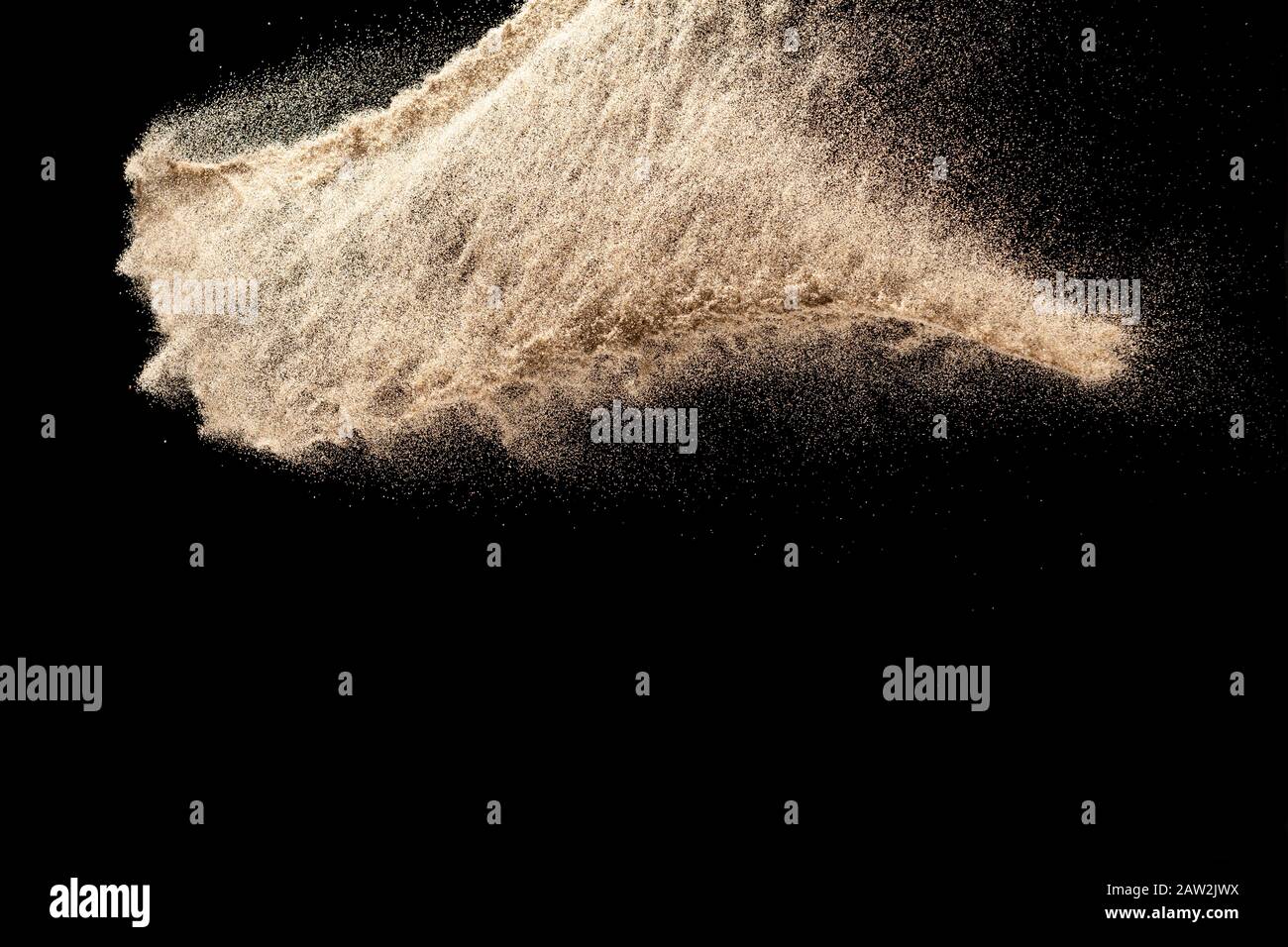 Dry river sand explosion isolated on black background. Abstract sand ...