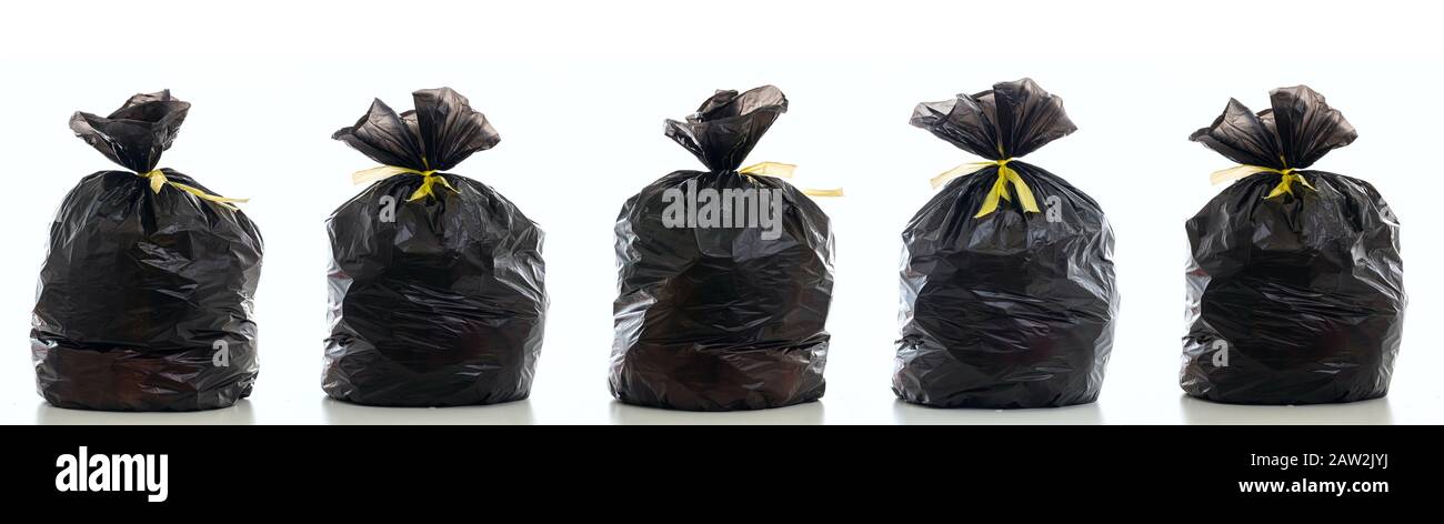 Trash, garbage bag black color full with litter and tied isolated ...