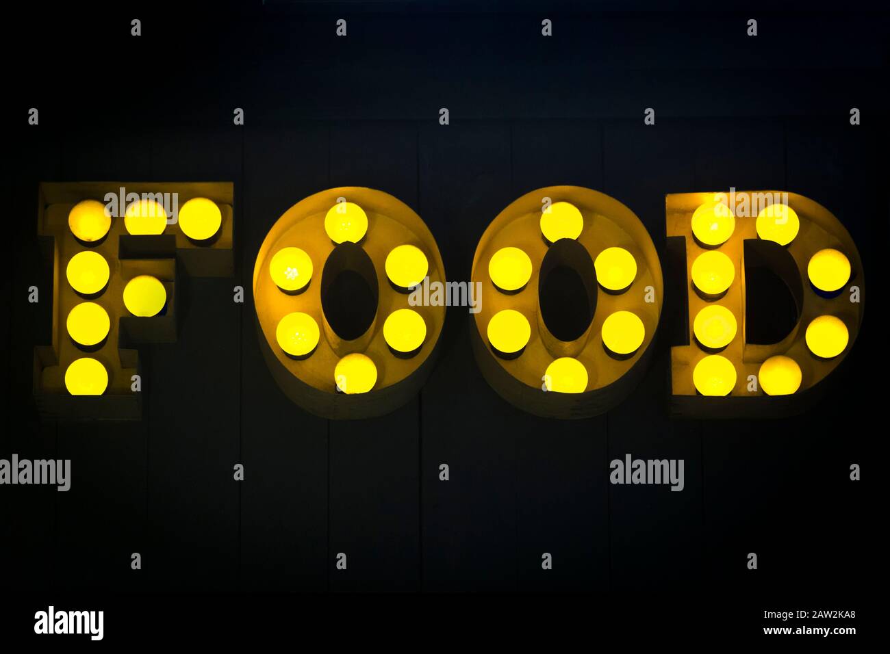 An old-fashioned "Food" sign with yellow lightbulbs Stock Photo - Alamy