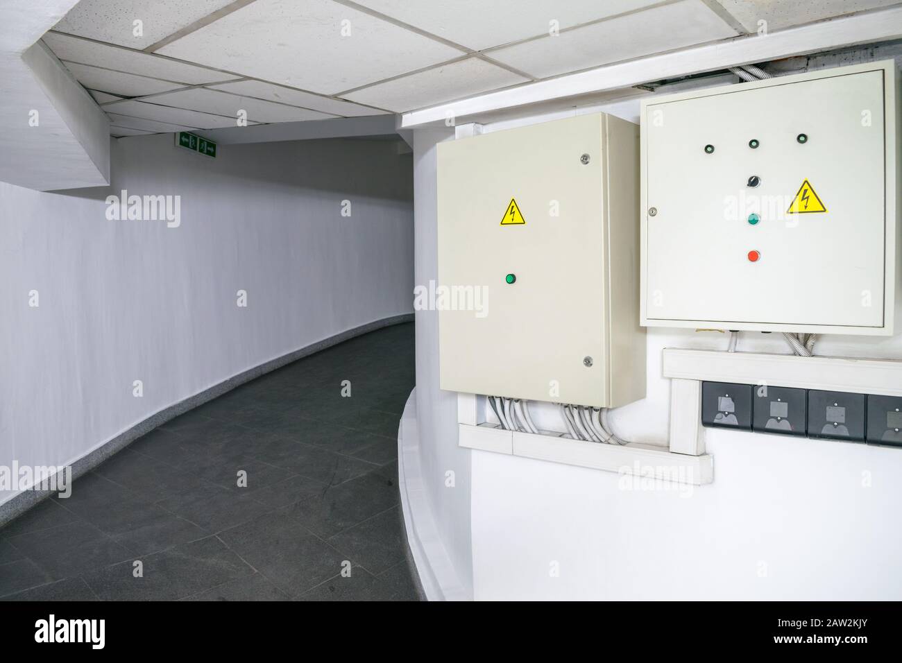 The electrical box is on the wall in an underground tunnel. Electric ...