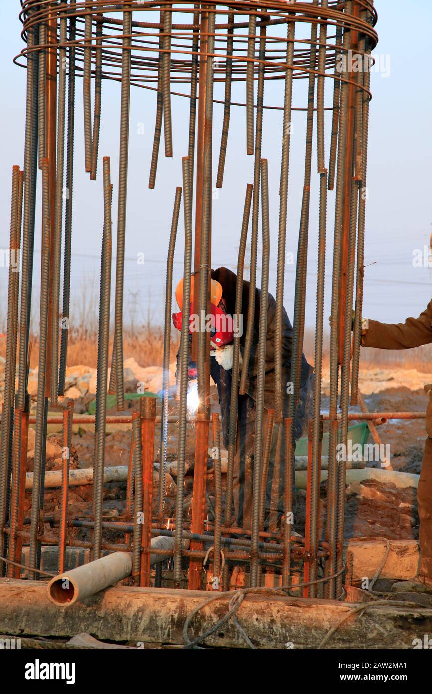 Bridge construction under performing the steel reinforcement of piling ...